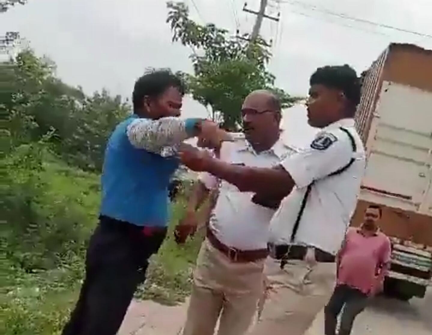 Watch: Jeedimetla traffic SI transferred for slapping truck driver